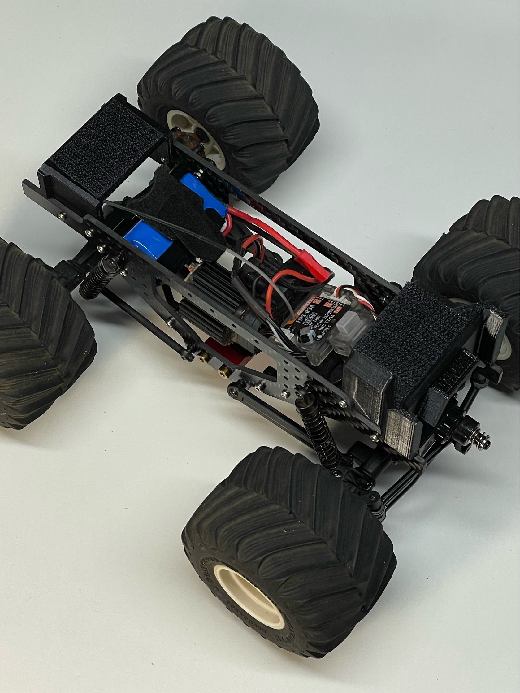 PTW Carbon Racing Chassis for the FMS FCX24 Smasher – Crawlers N Customs